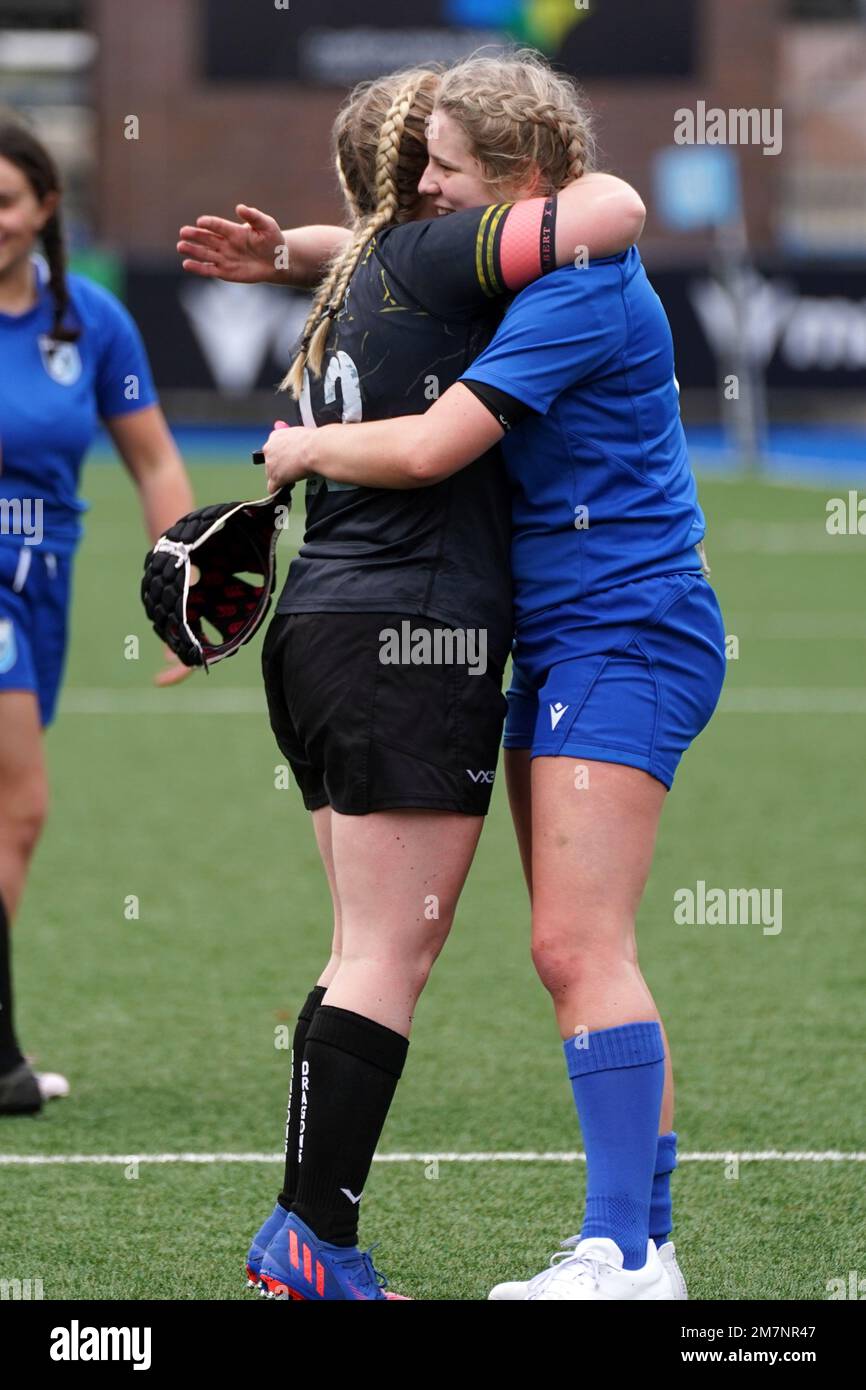 Ywo female rugby players embrace at the end of a rugby match Stock ...