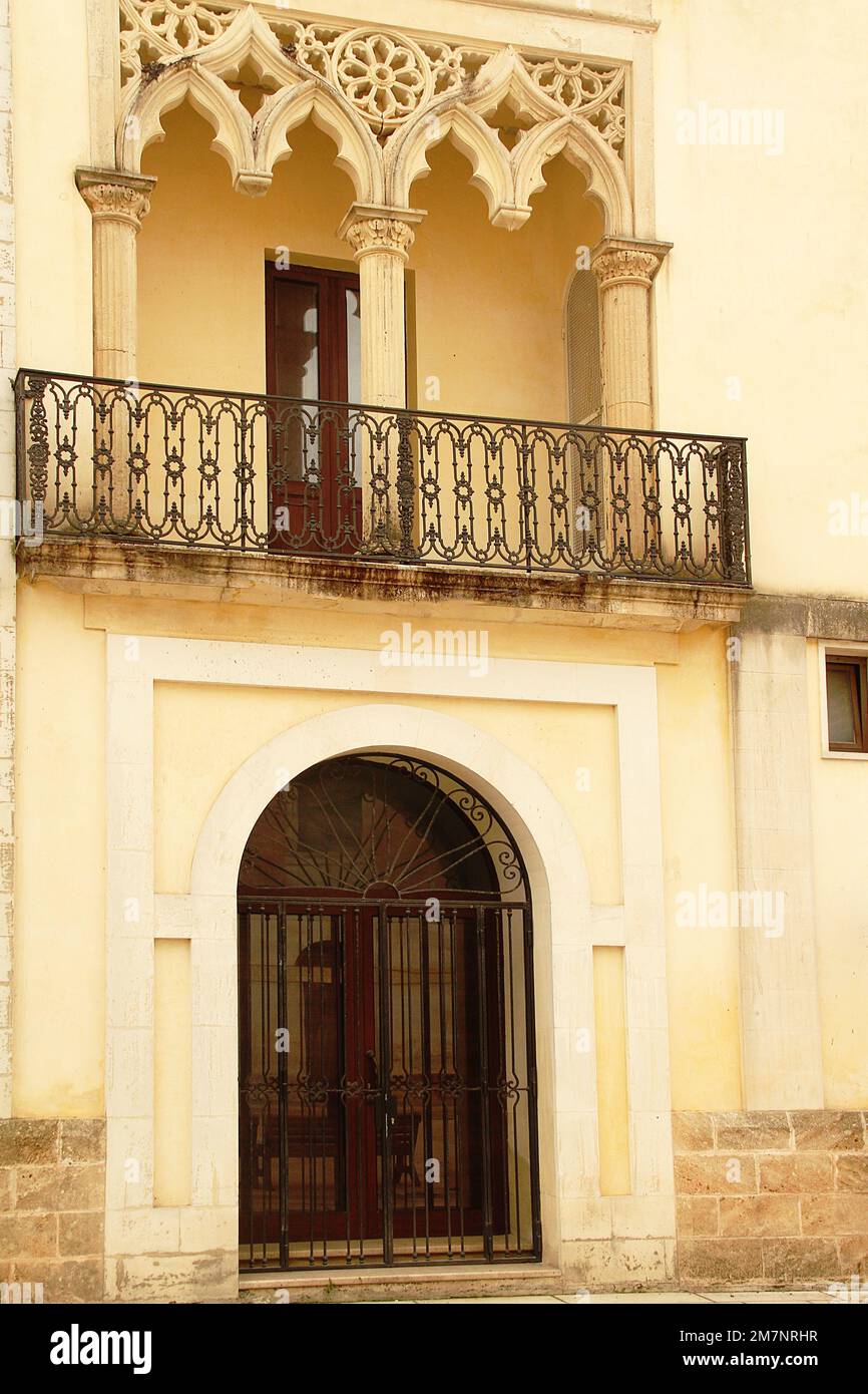 Racale, Italy. Balcony of a building in the historical center, with ...