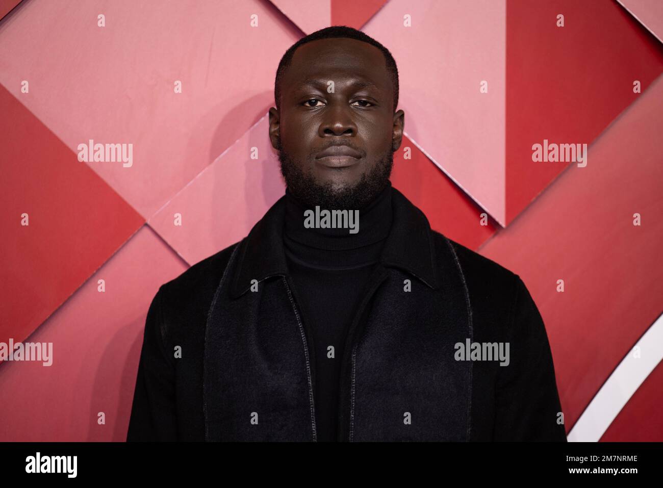 Michael Ebenezer Kwadjo Omari Owuo Jr., known professionally as Stormzy, poses for photographers ...