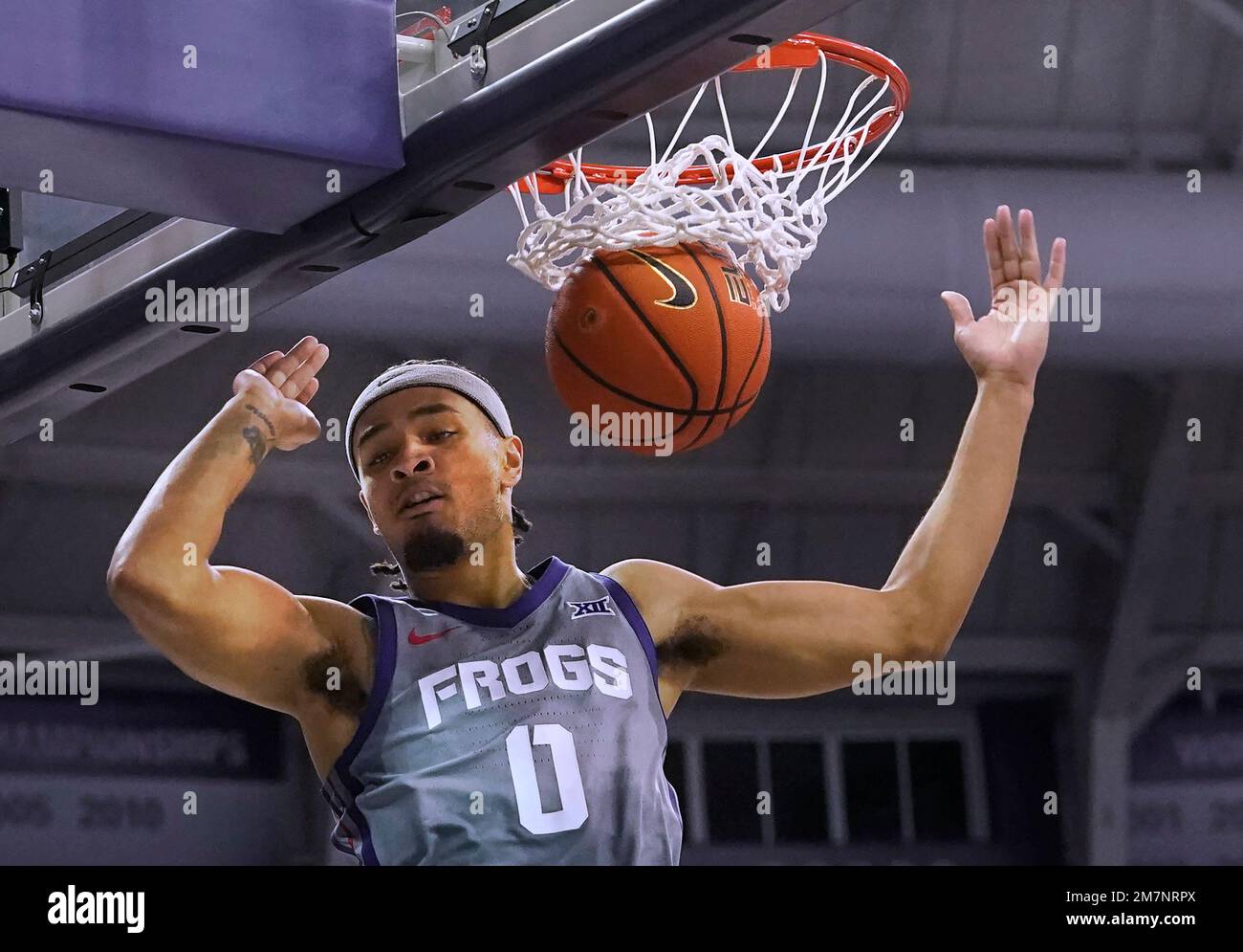 TCU guard Micah Peavy scores during the second half of the team's NCAA ...