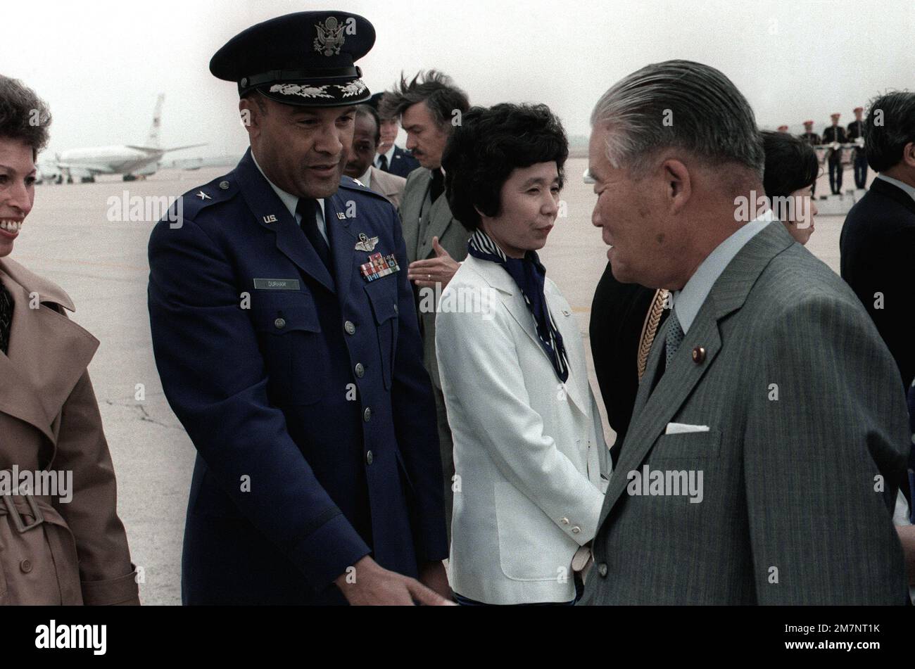 Prime Minister Masayoshi Ohira of Japan is greeted by BGEN Archer L ...