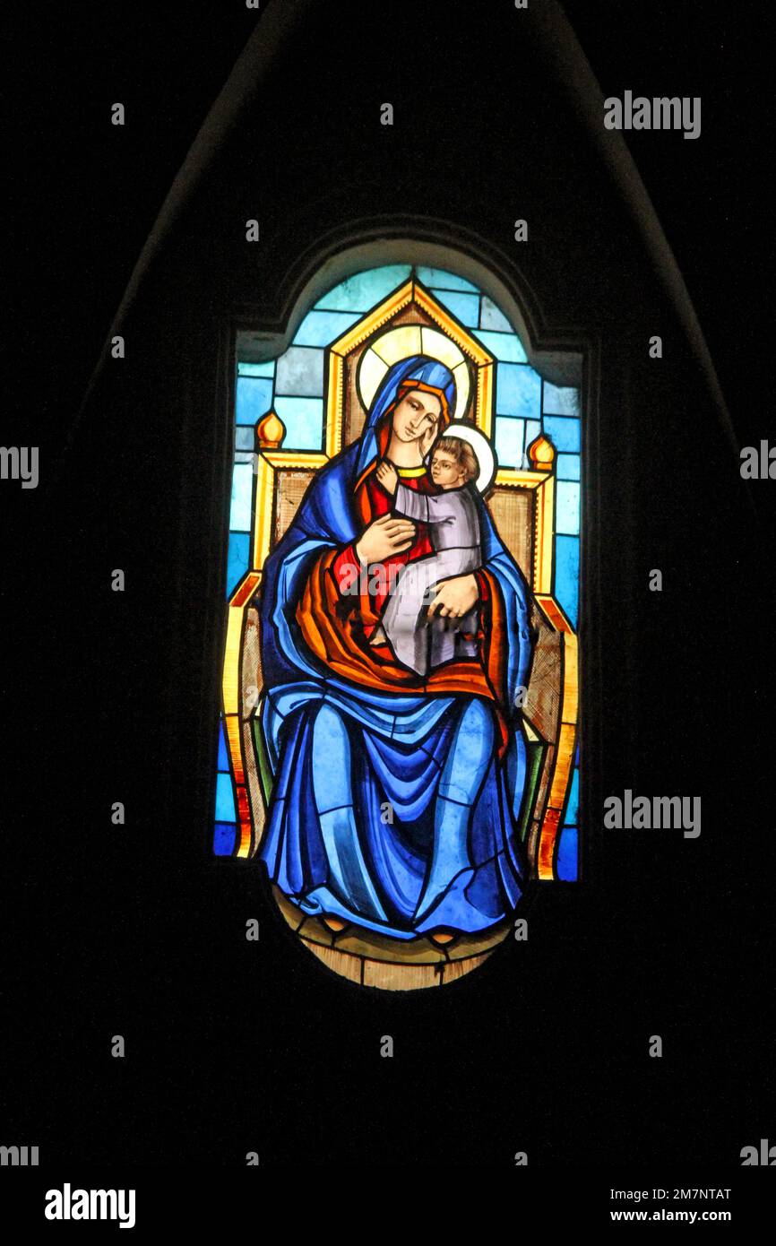 Racale, Italy. Stained glass depicting the Mother of God with baby ...