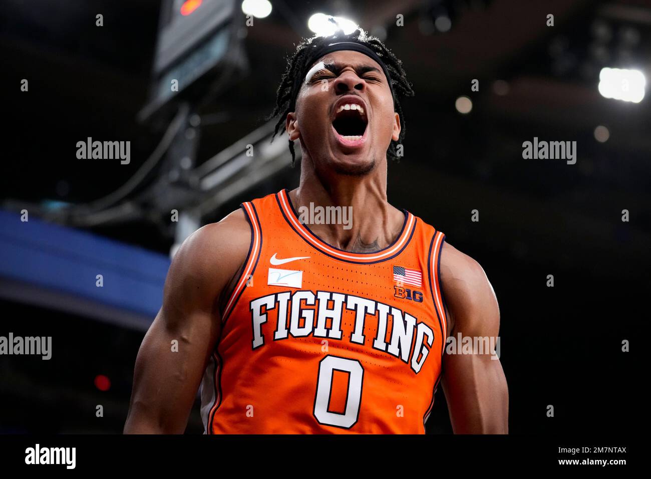 Illinois' Terrence Shannon Jr. (0) reacts after scoring and drawing a ...