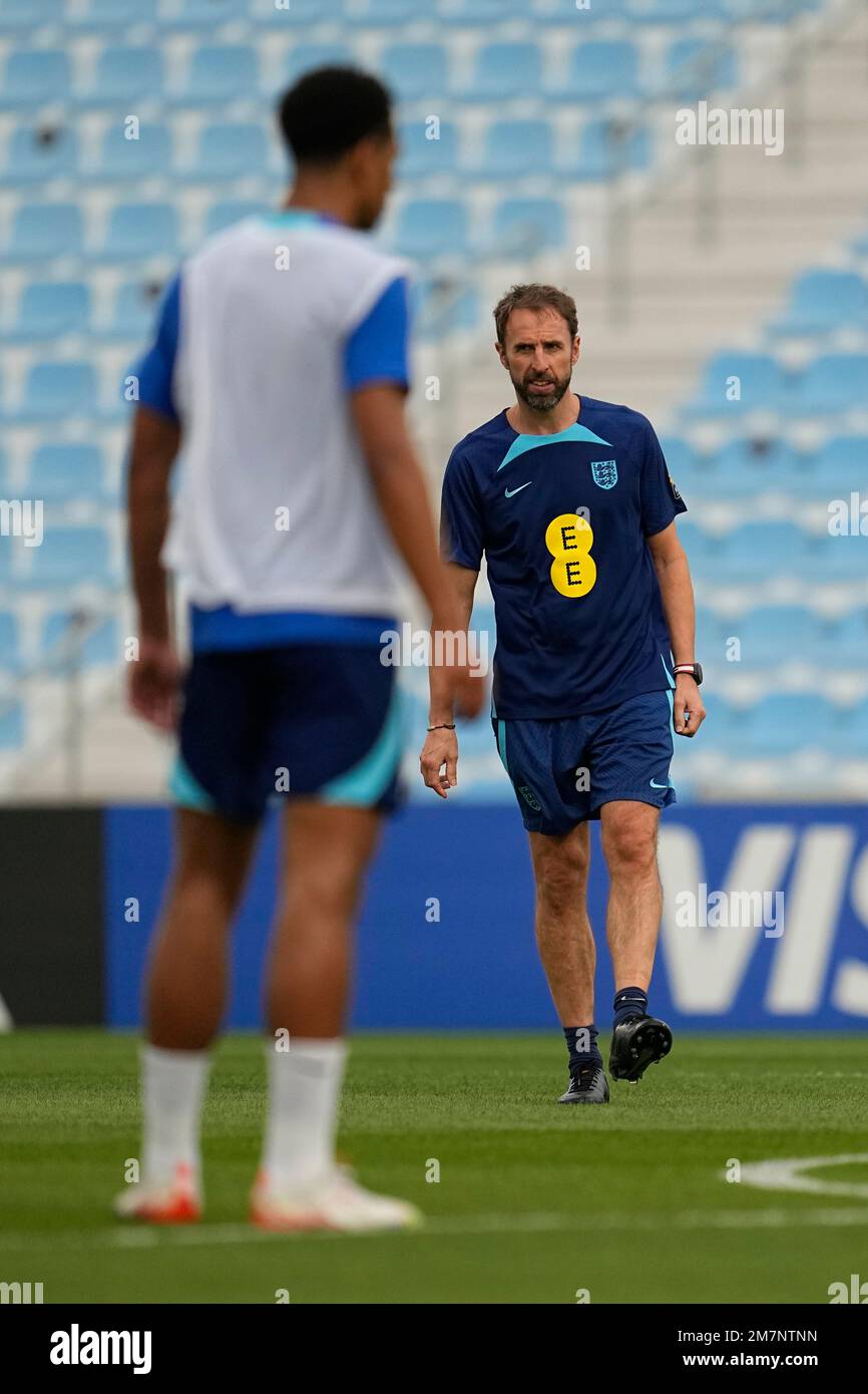 England's head coach Gareth Southgate, right, watches his team ...