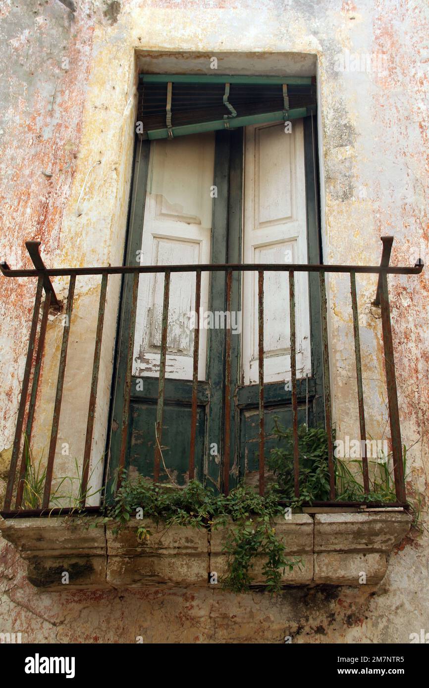 Tiny balcony of an abandoned building in the historical center of ...