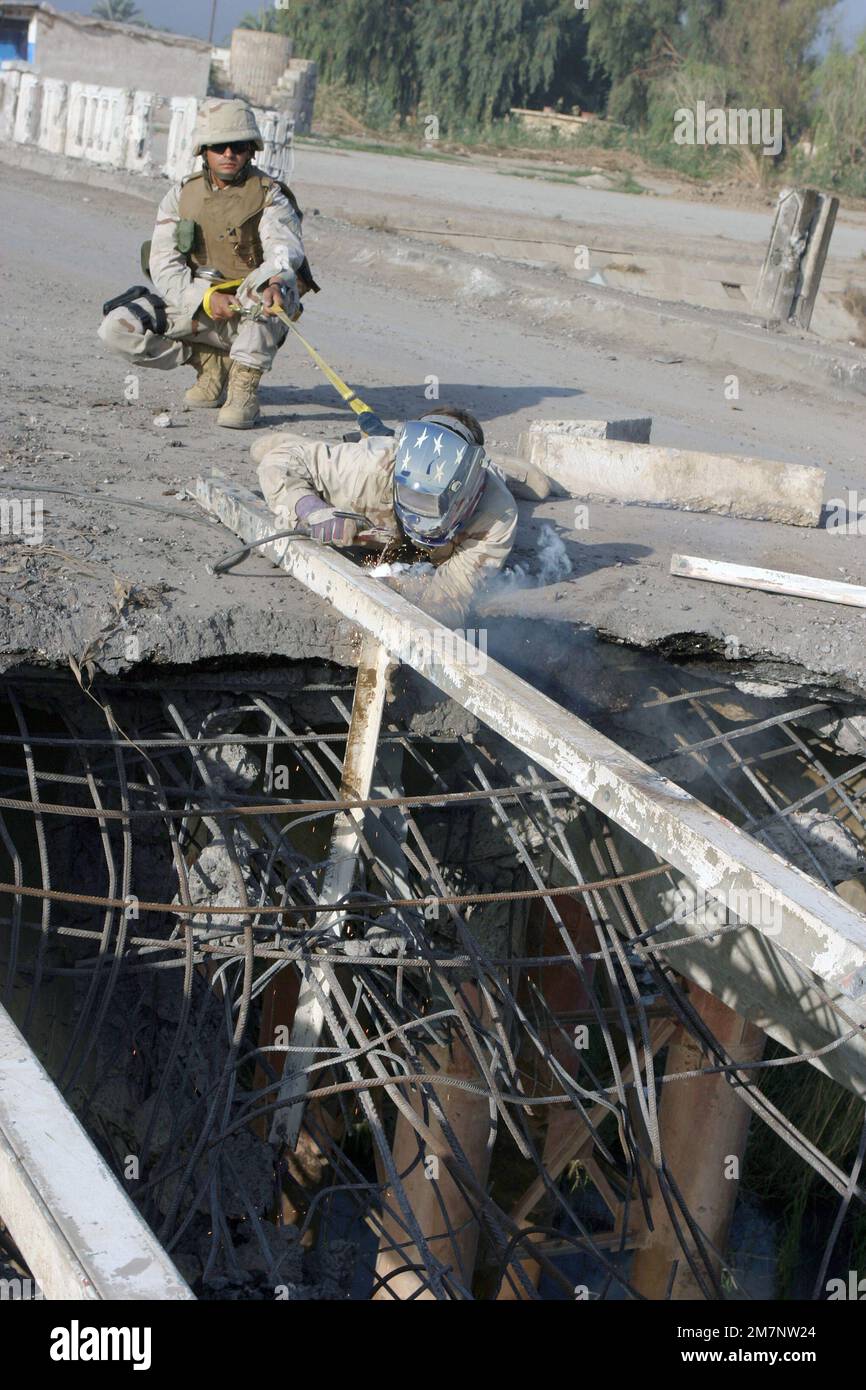 041116-M-1250B-012. [Complete] Scene Caption: US Navy (USN) Seabee ...