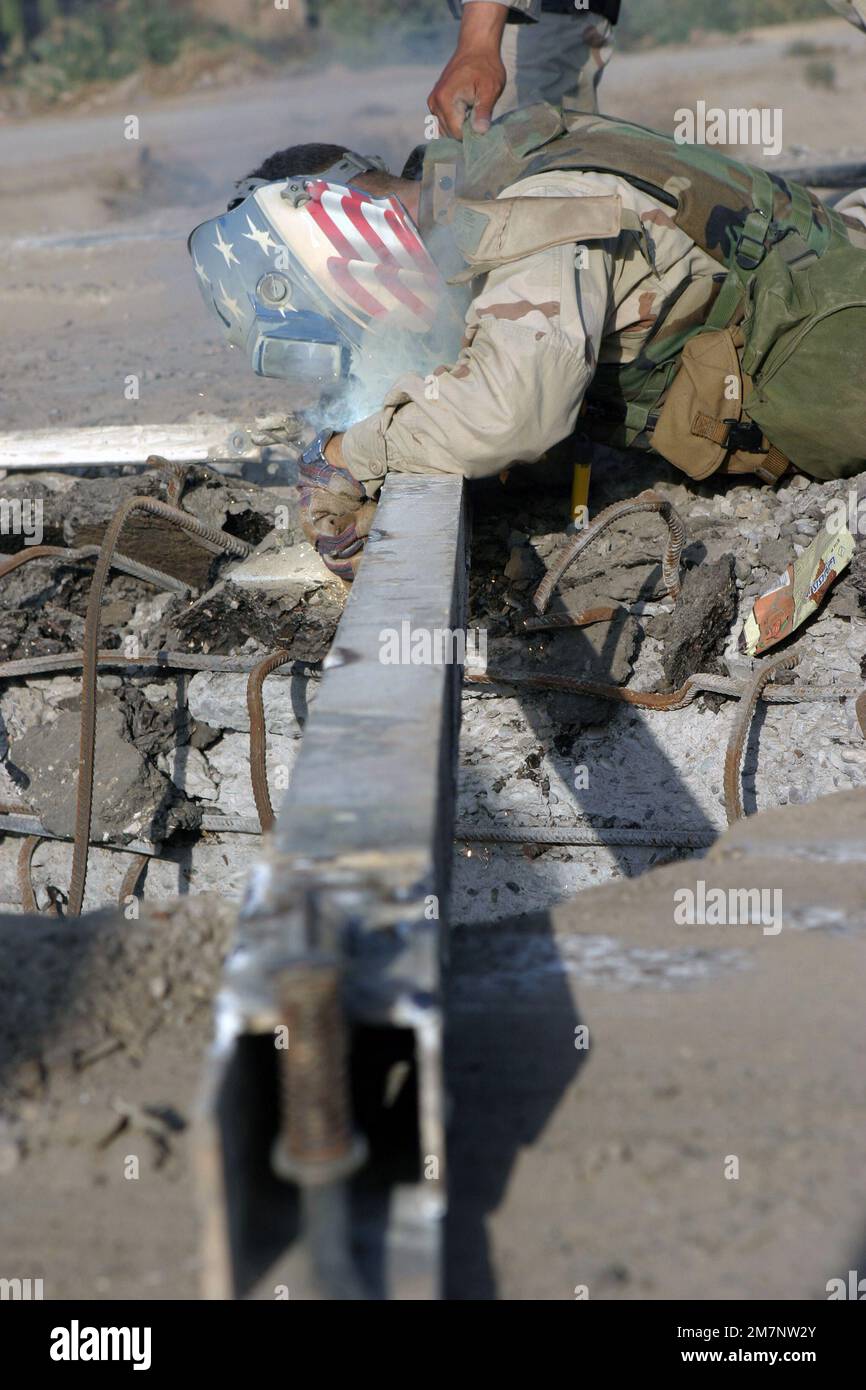 041116-M-1250B-023. [Complete] Scene Caption: US Navy (USN) Seabee ...