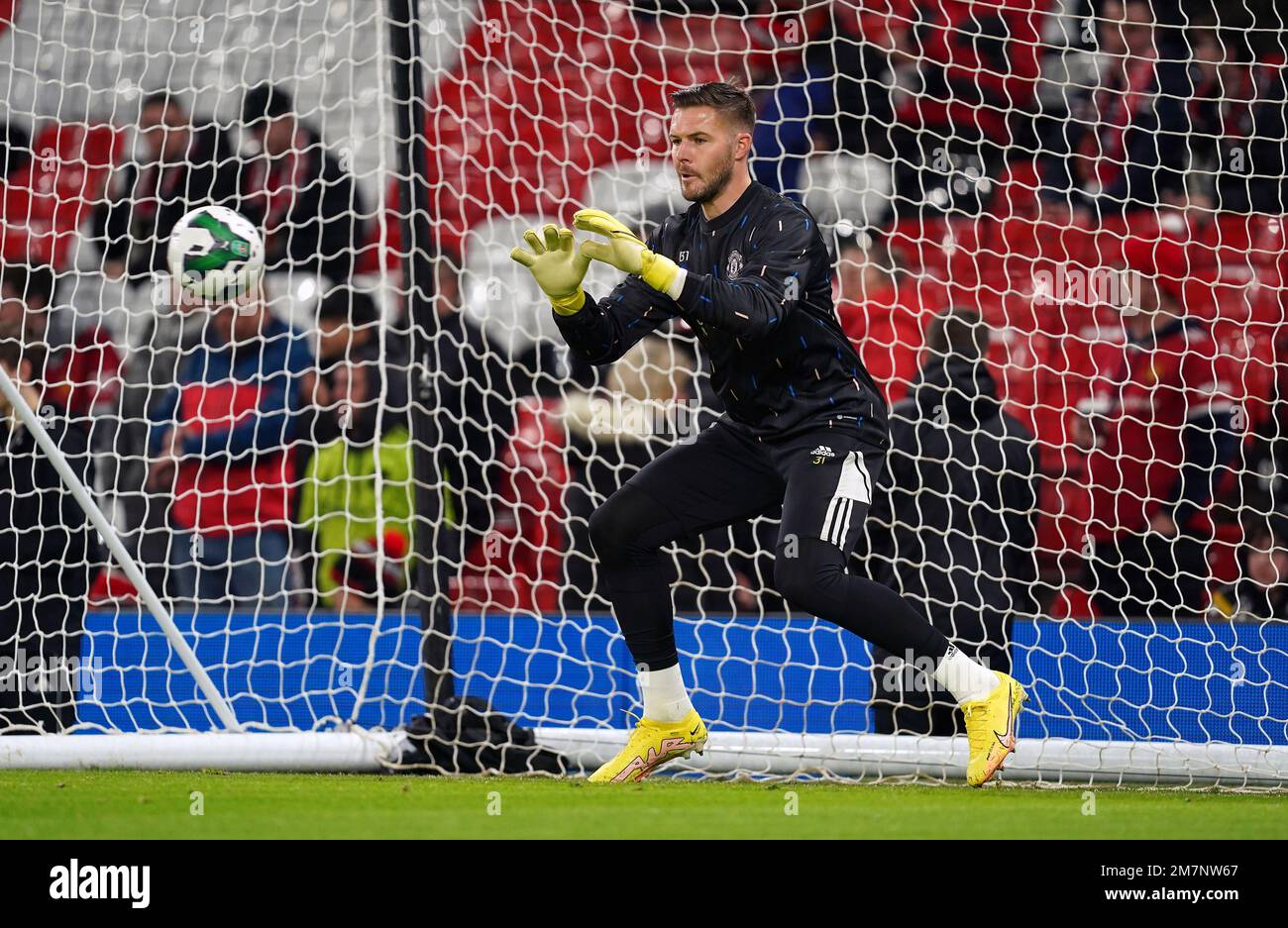 Manchester United goalkeeper Jack Butland warms up before the Carabao ...