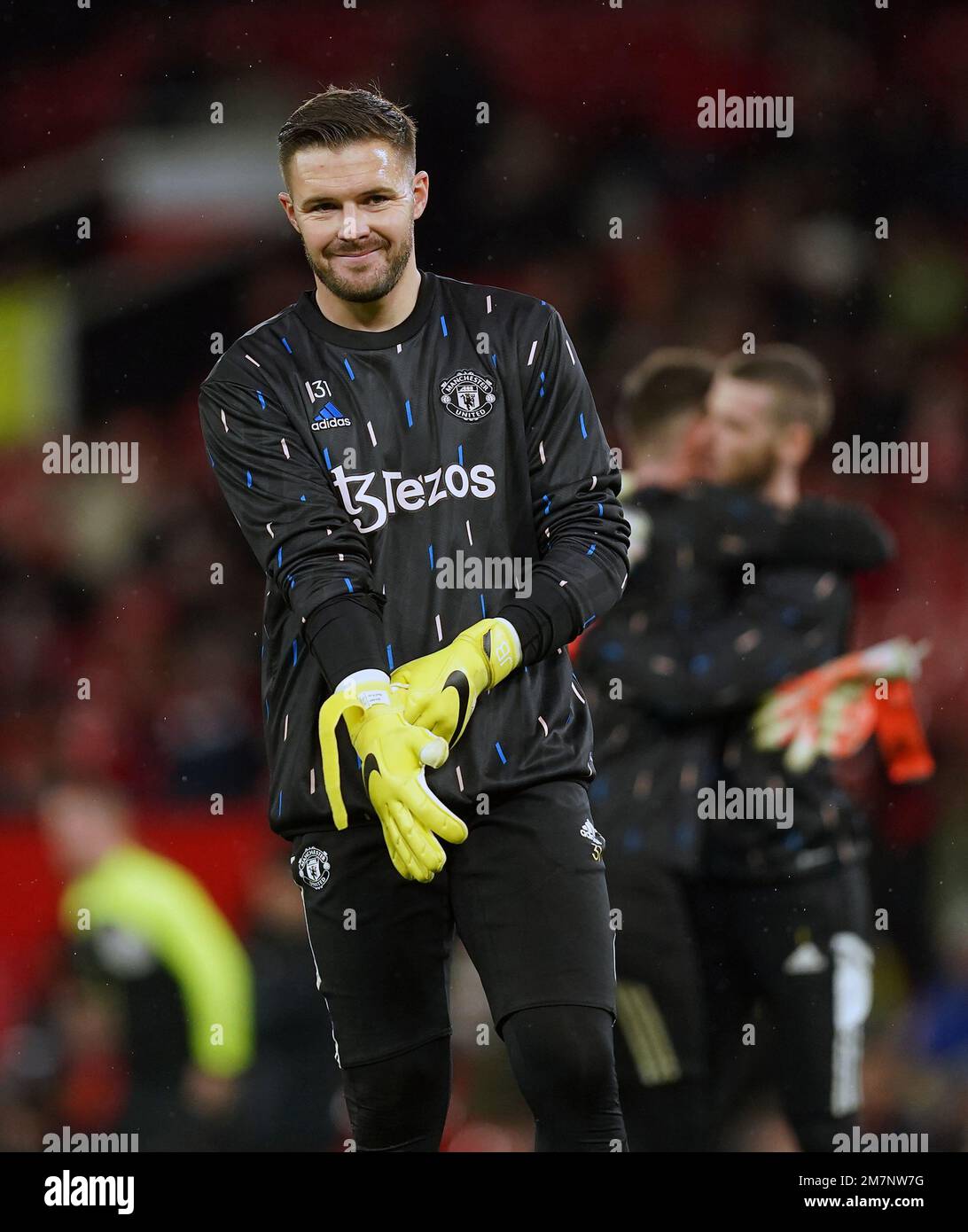 Manchester United goalkeeper Jack Butland warms up before the Carabao ...