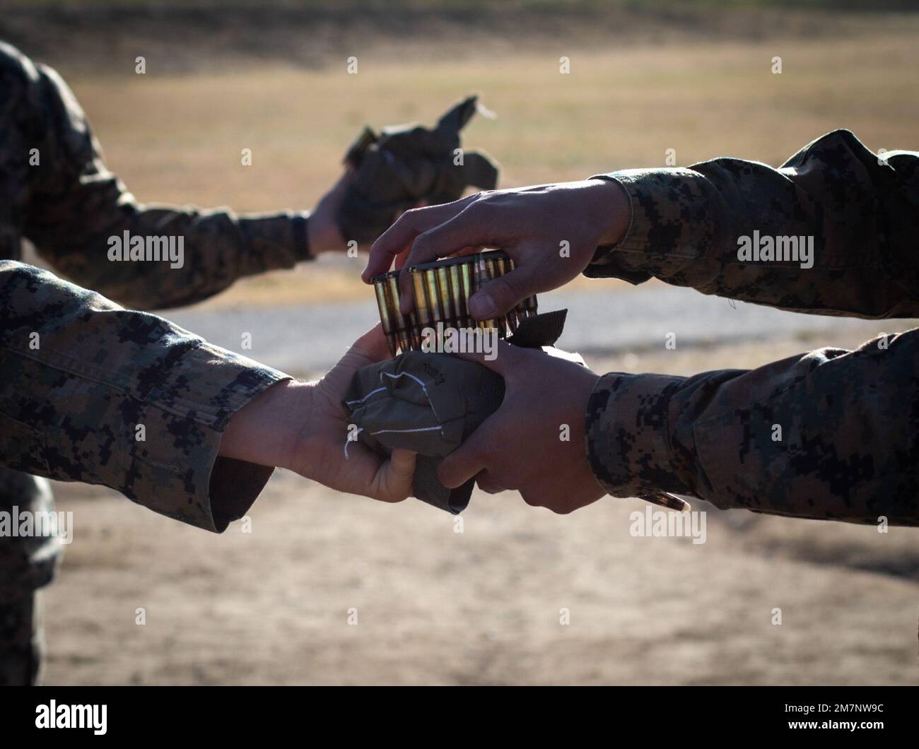 U.S. Marines receive ammo before conducting their annual rifle ...