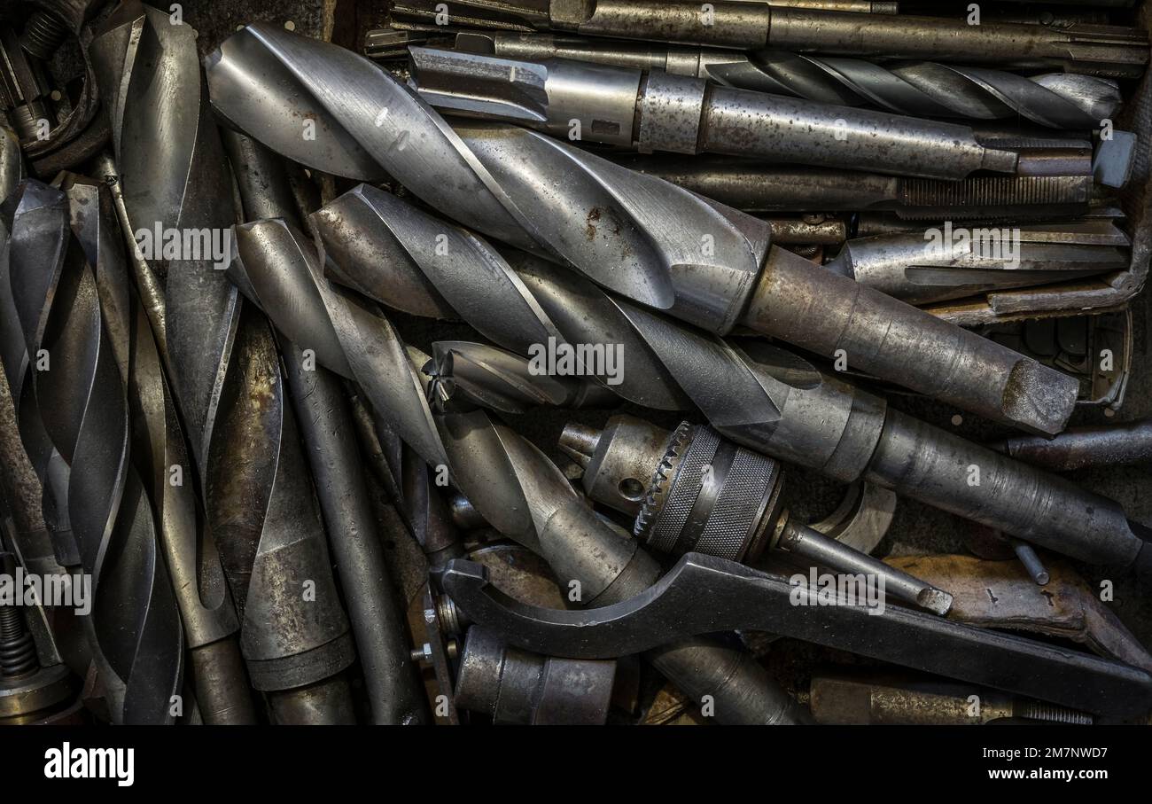 background pattern of used drilling tools Stock Photo - Alamy
