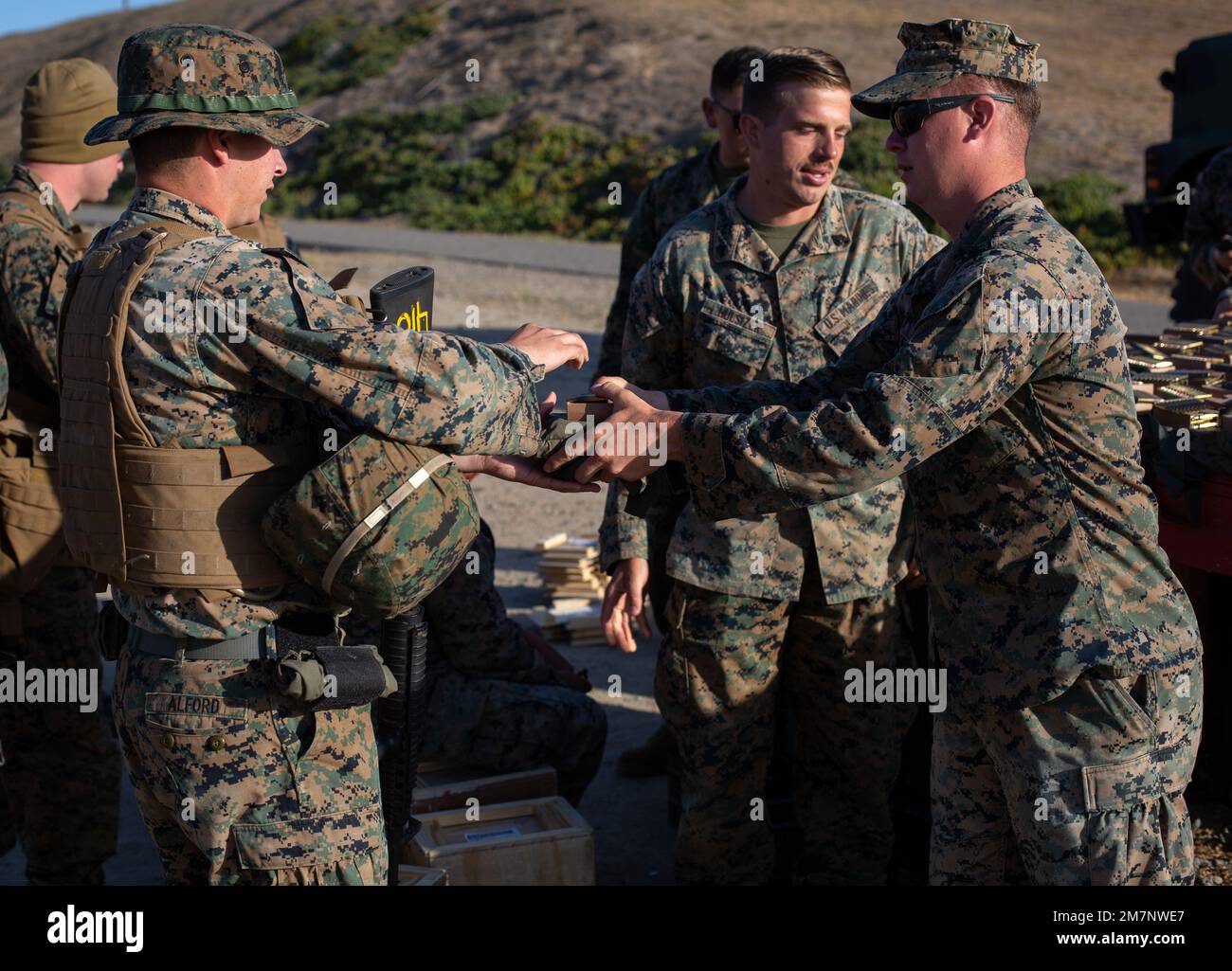 U.S. Marines receive ammo before conducting their annual rifle ...
