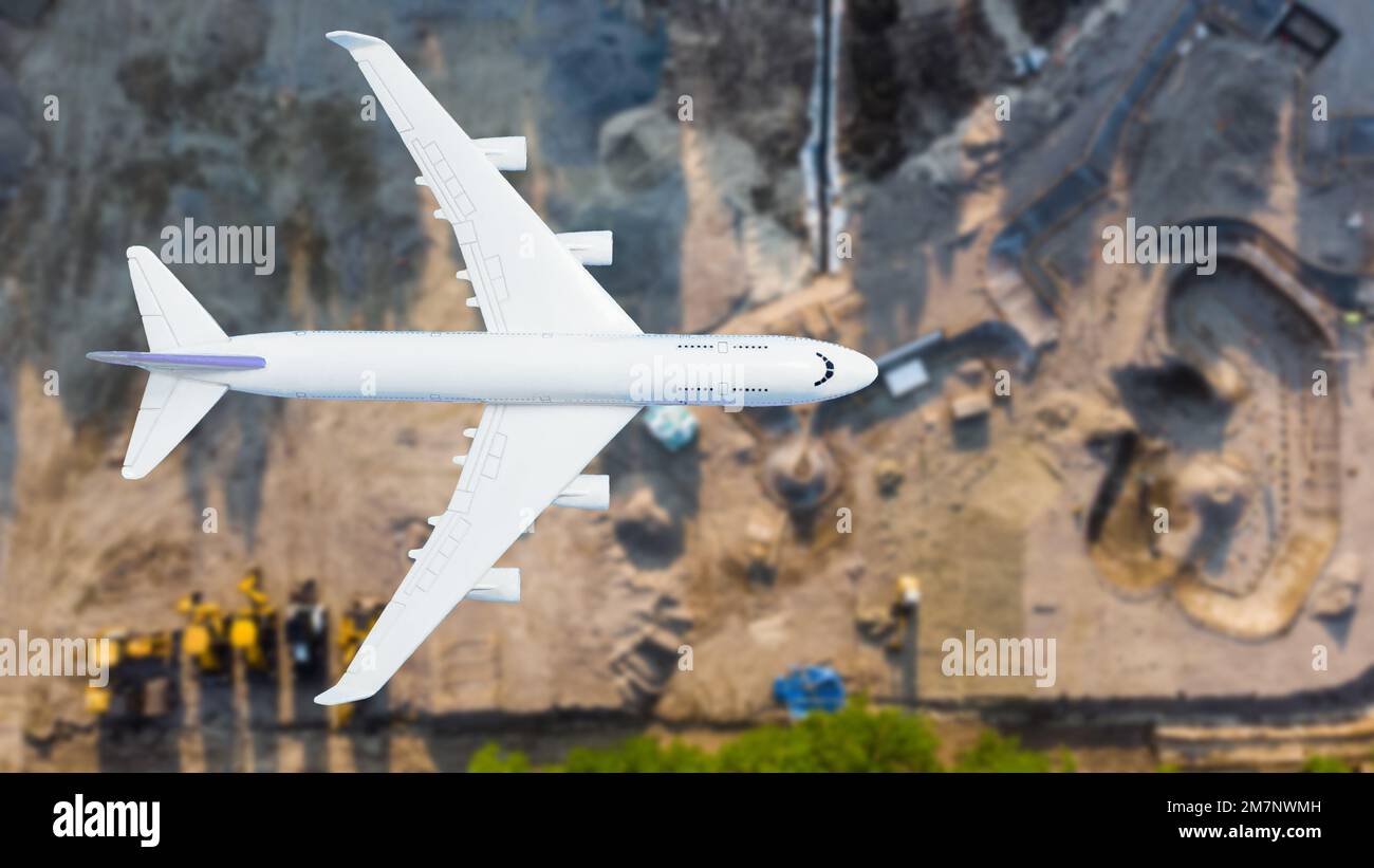plane above the ground. Aerial city view Stock Photo - Alamy