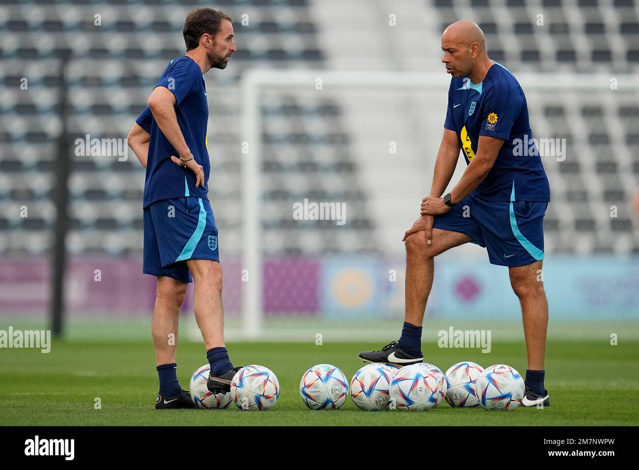 England's head coach Gareth Southgate, left, and assistant coach Paul ...
