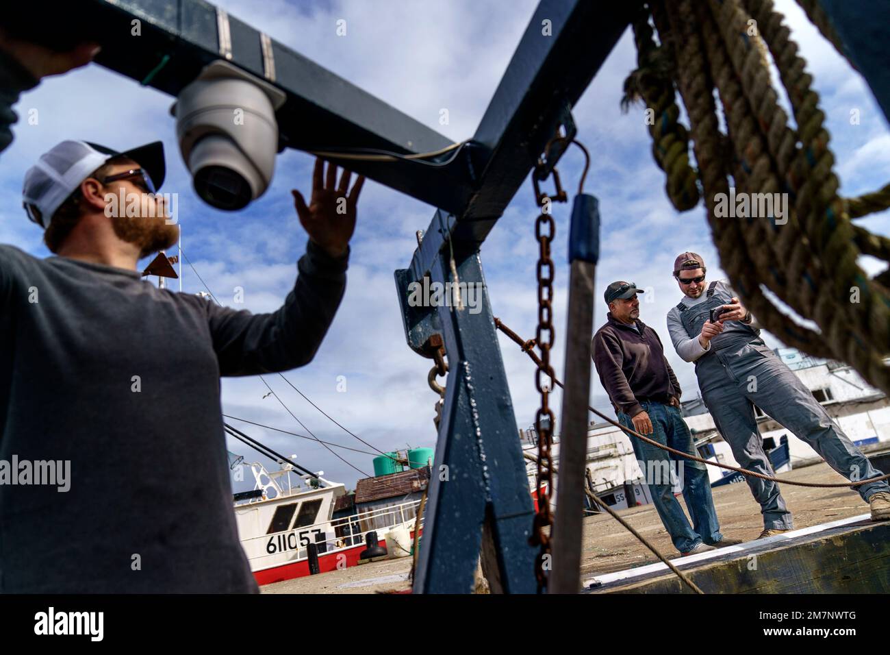 Mark Hager, left, positions a camera with the help of Anthony Lucia ...