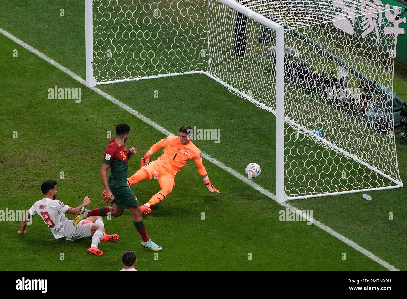 Portugal's Goncalo Ramos, second left, scores his side's third goal in ...
