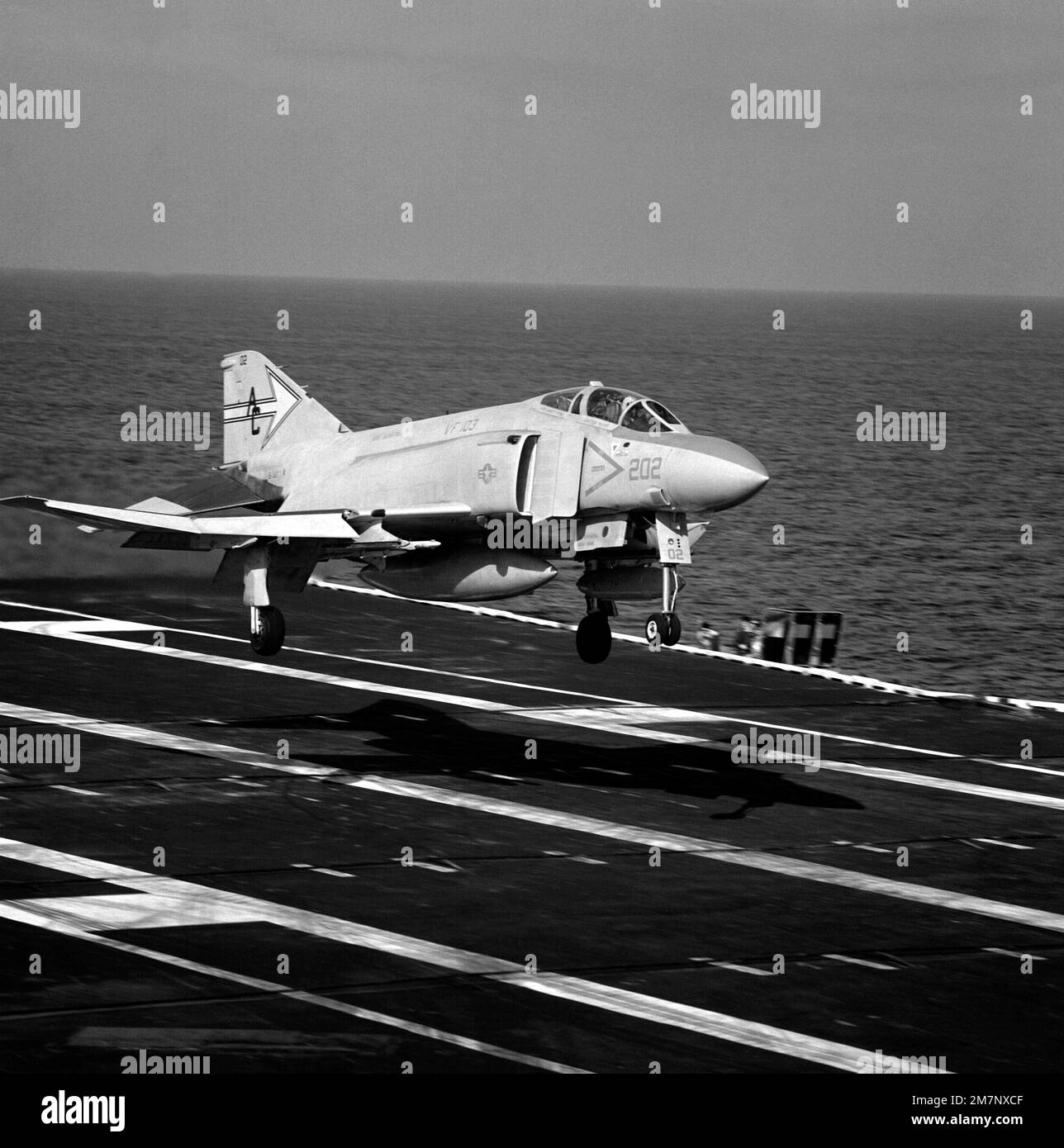 A right side view of an F-4J Phantom II aircraft from Fighter Squadron 103 (VF-103) assigned to ...