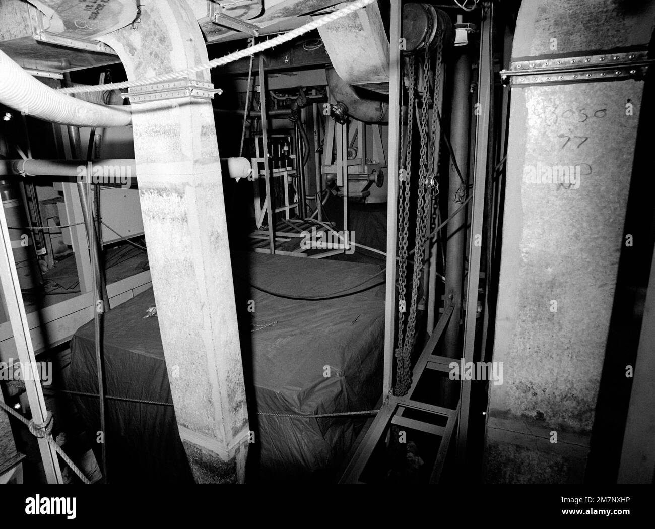 An interior view of the engine room on the guided missile frigate USS ...