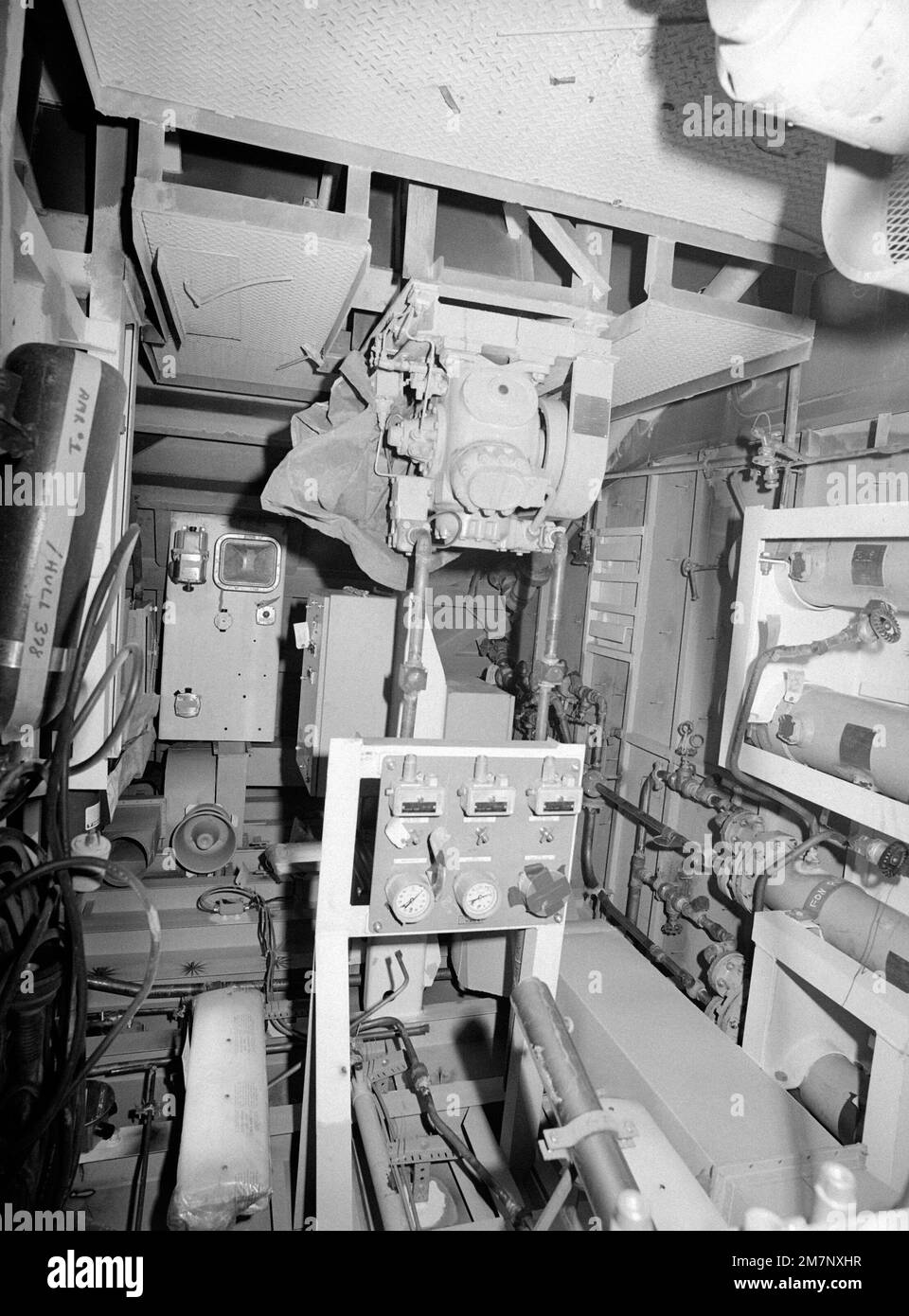 An interior view of auxiliary machine room No. 1 on the guided missile ...