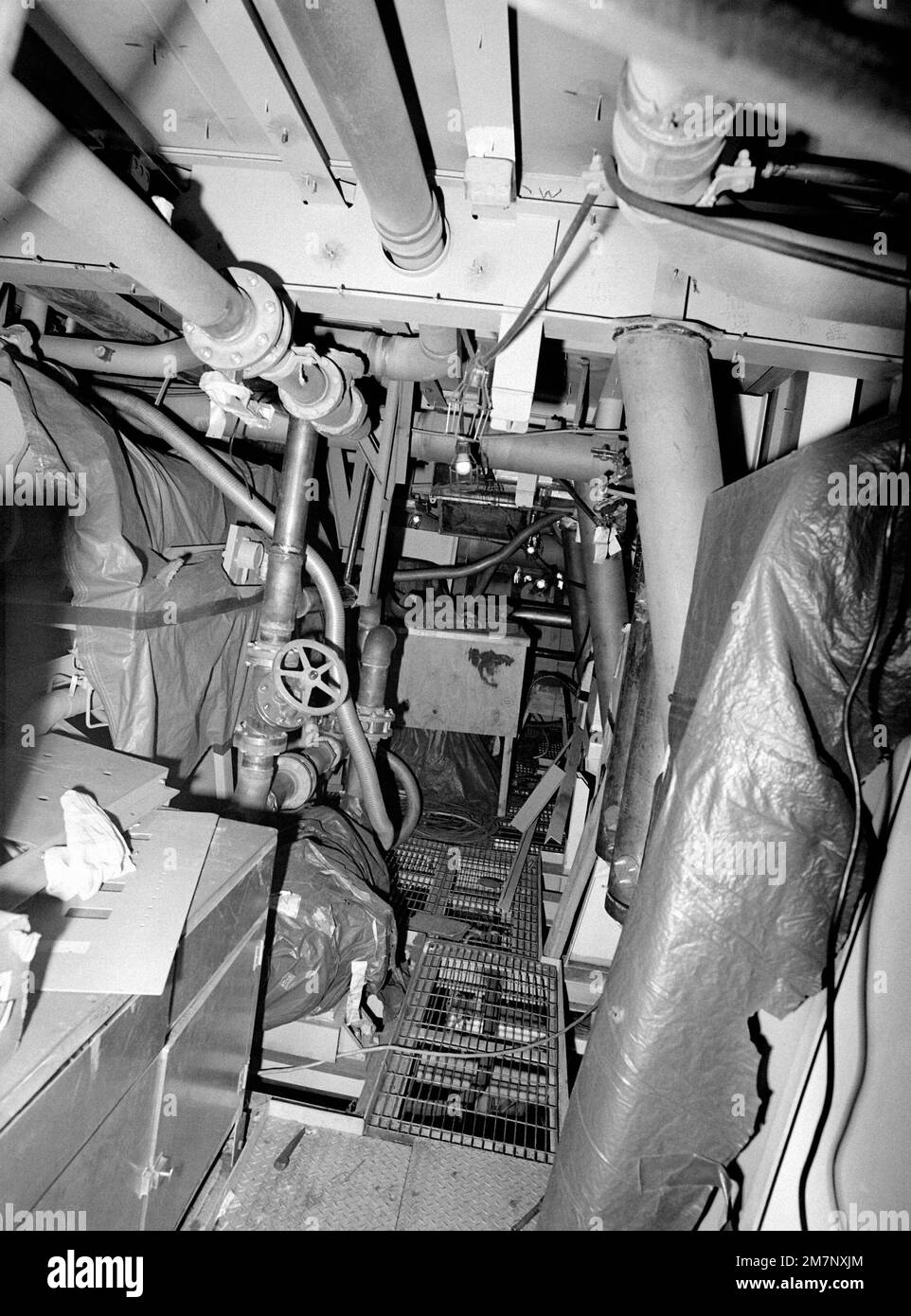 An interior view of auxiliary machine room No. 2 on the guided missile ...