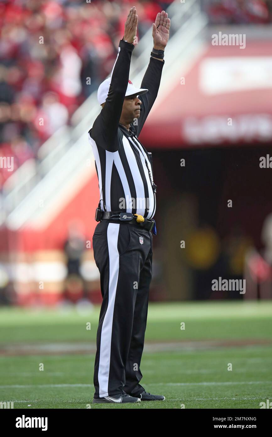 Referee Adrian Hill (29) signals during an NFL football game between ...