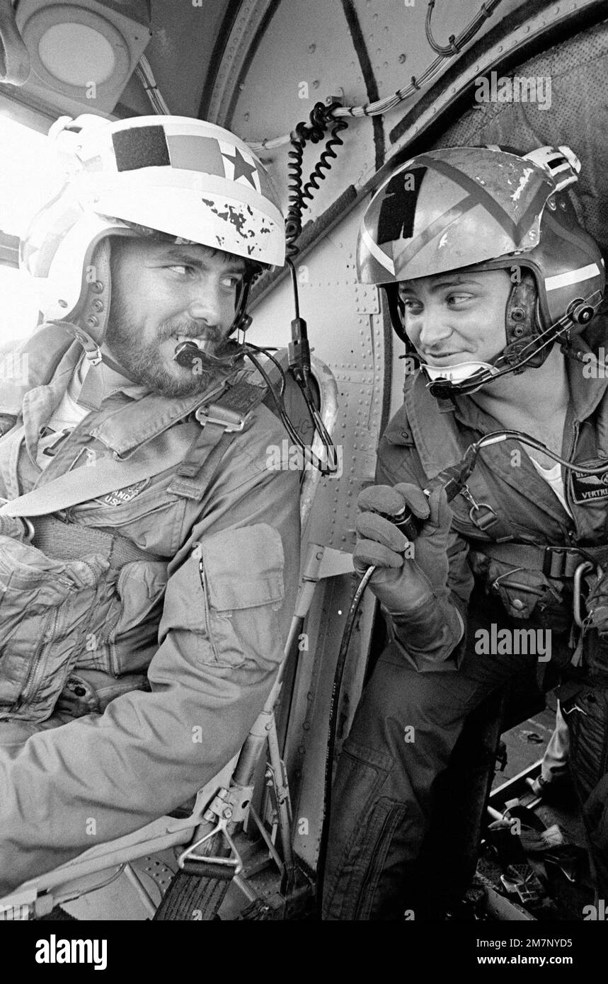 Lieutenant Junior Grade Michael G. Hegland, left, a pilot, and Aviation ...