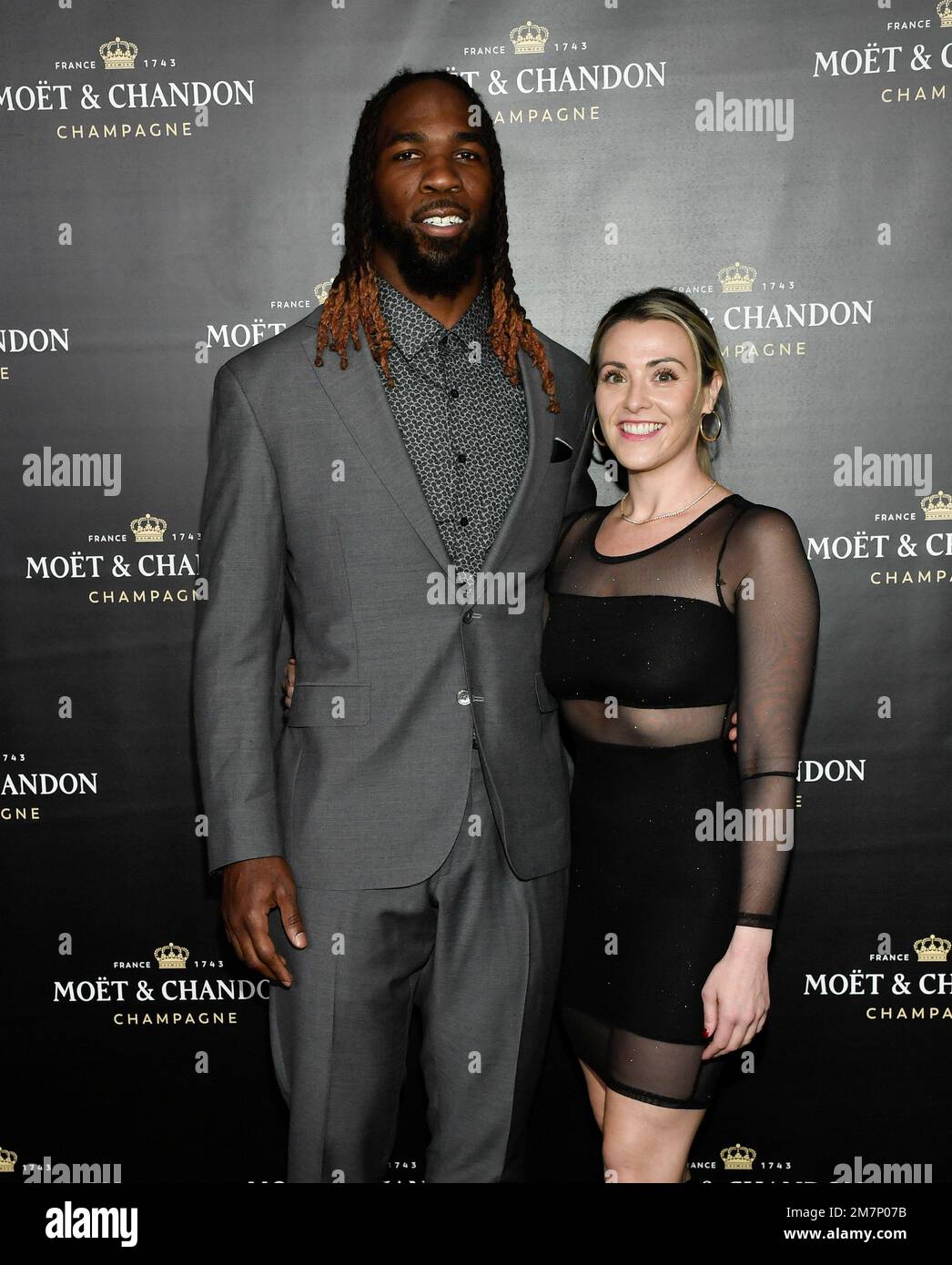 CJ Mosley, left, and Jamie Reiff attend the Moet & Chandon holiday ...