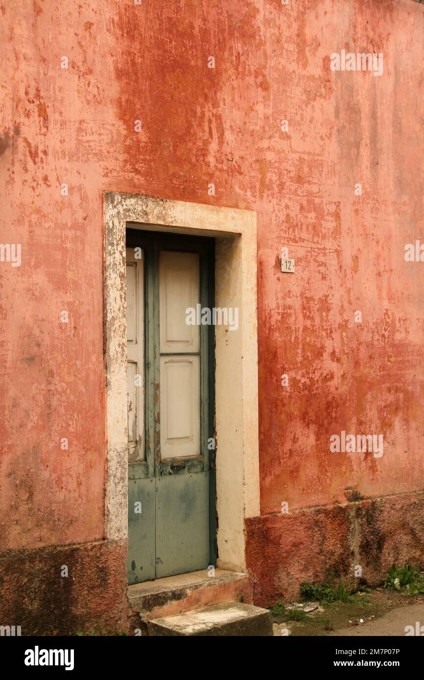 Neglected facade of a building in the historical center of Racale ...