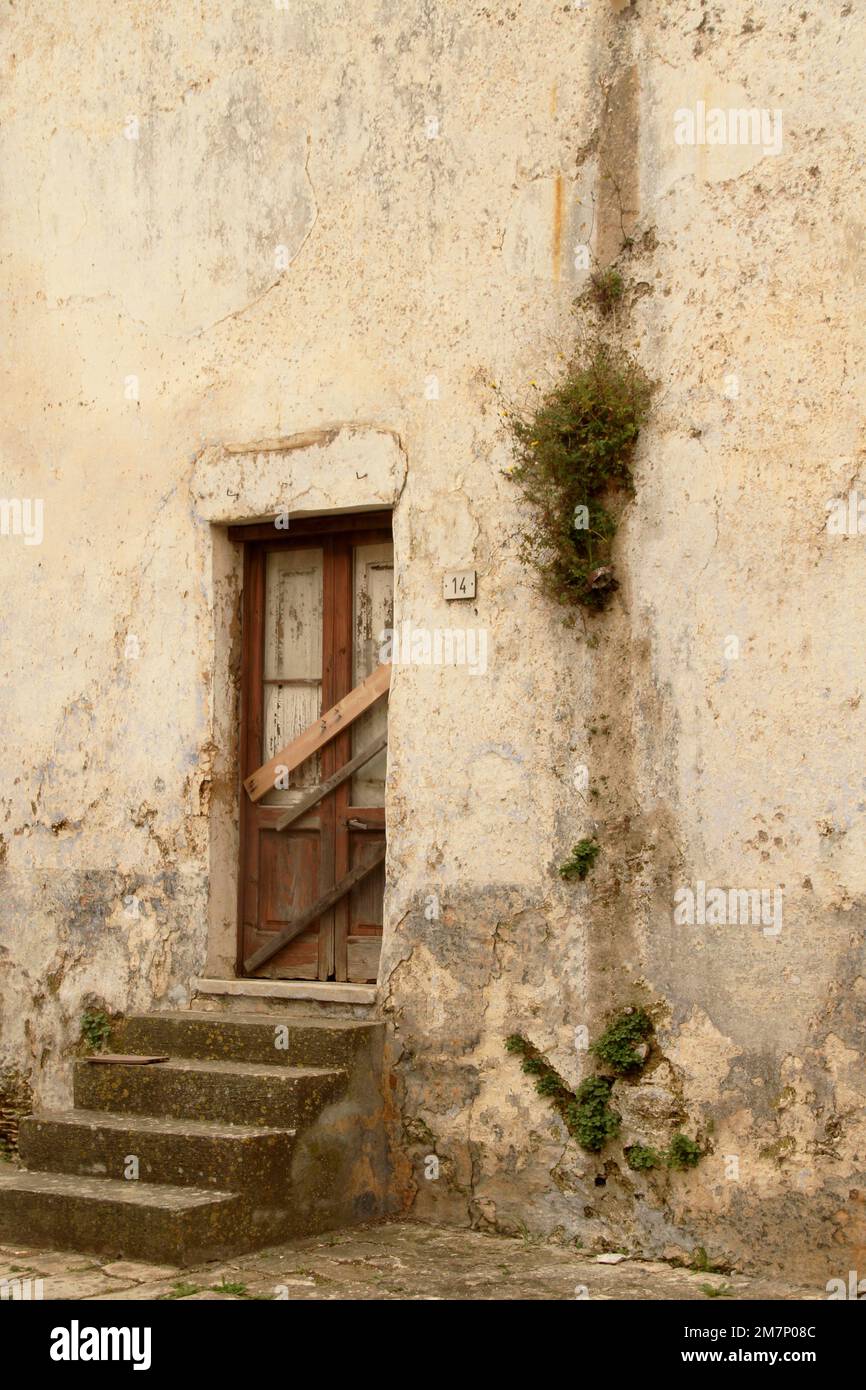 Neglected facade of a building in the historical center of Racale ...