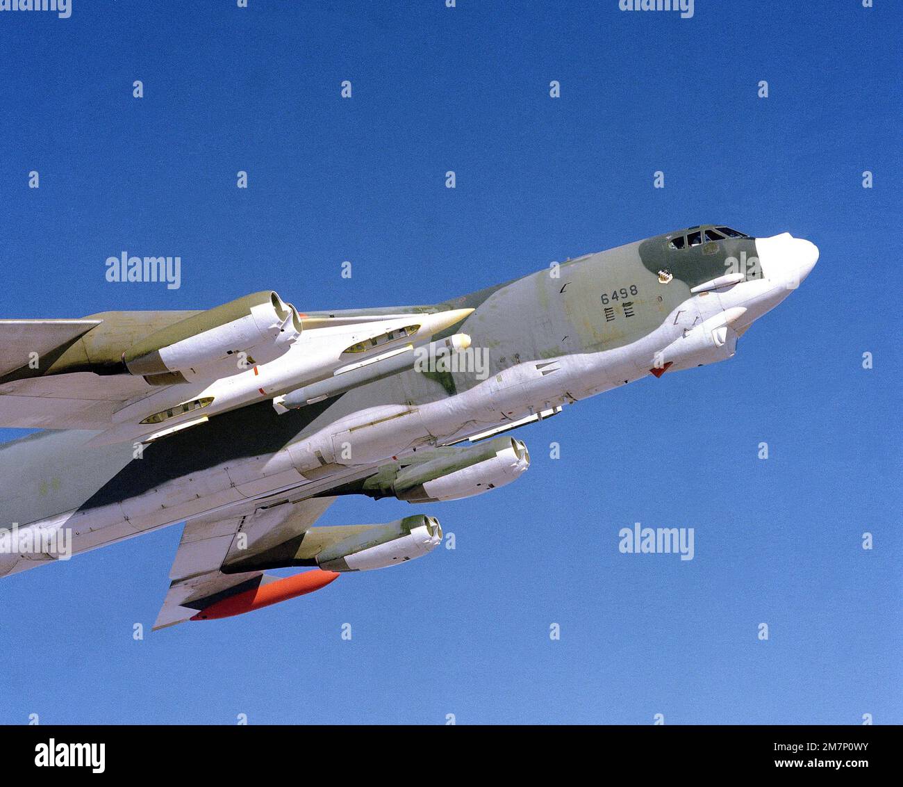 AN air-to-air right side view of a B-52 Stratofortress aircraft ...