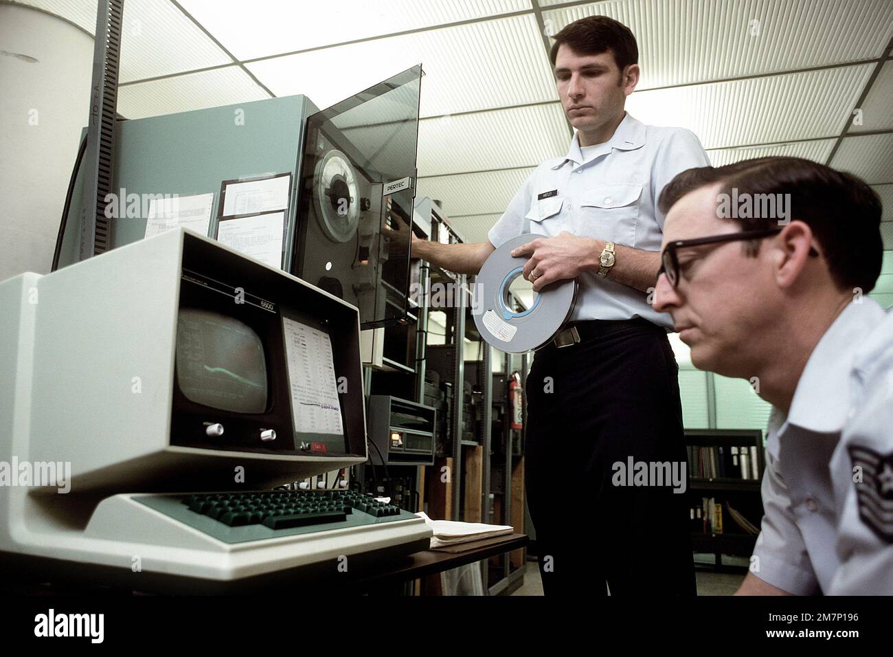 1LT Richard Hartley, chief, radiation measurements, and MSGT Earl Henry ...
