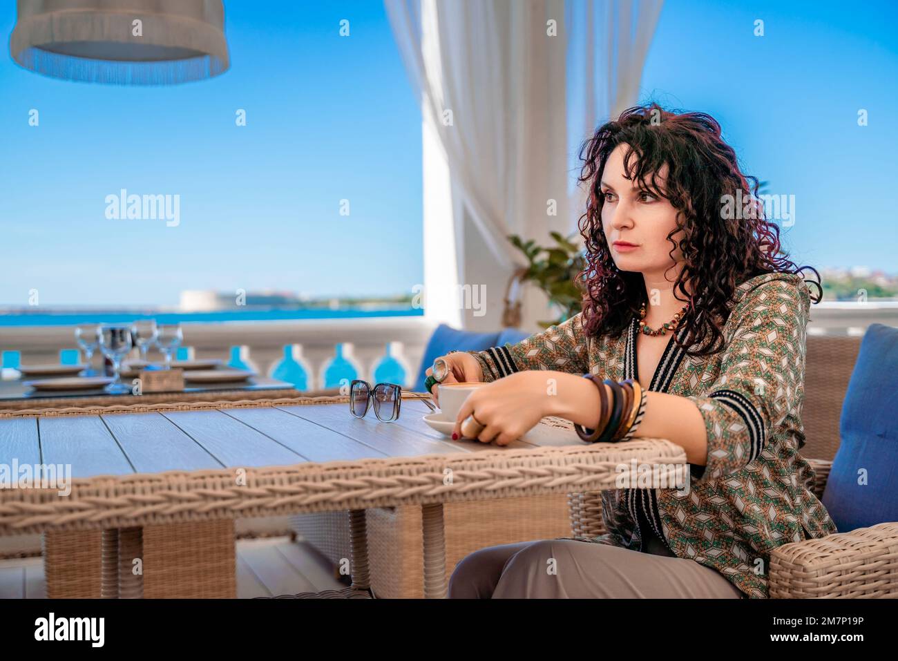 Portrait of an adult beautiful woman in an elegant suit in a cafe Stock ...