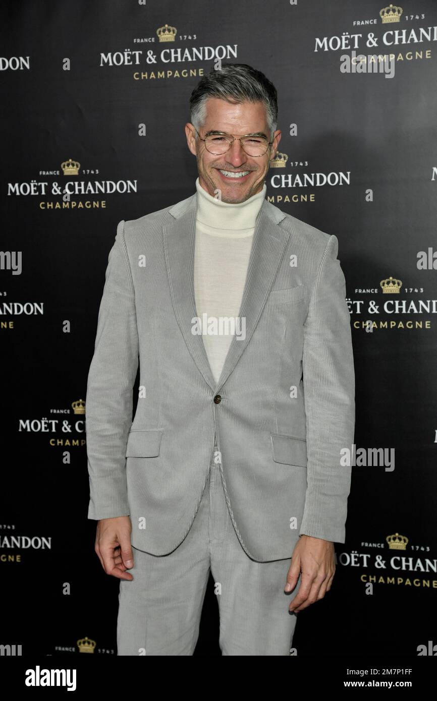 Eric Rutherford attends the Moet & Chandon holiday season celebration ...