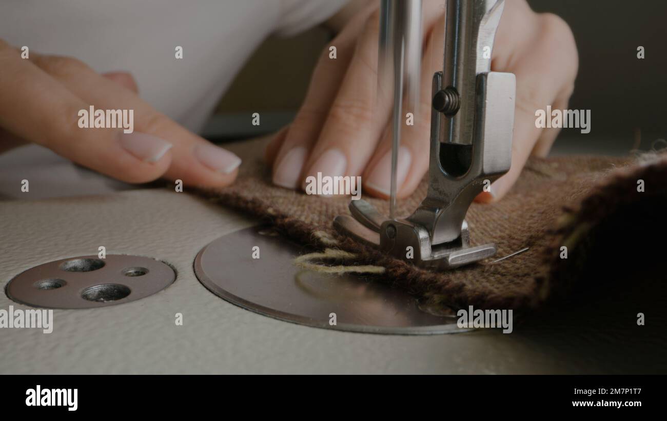 Sewing needle in fabric hi-res stock photography and images - Alamy