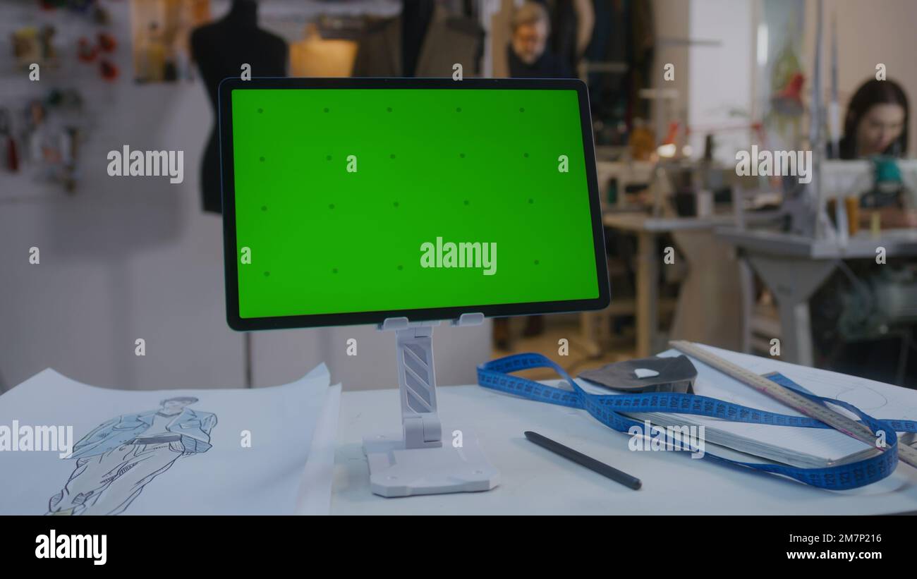 Digital tablet computer with green screen chromakey standing on the ...