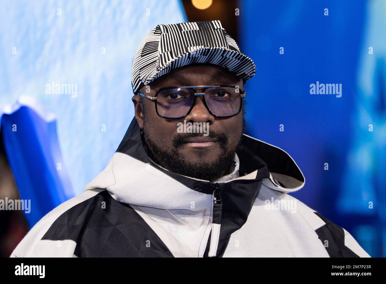 William Adams, a.k.a. Will.i.am poses for photographers upon arrival at ...