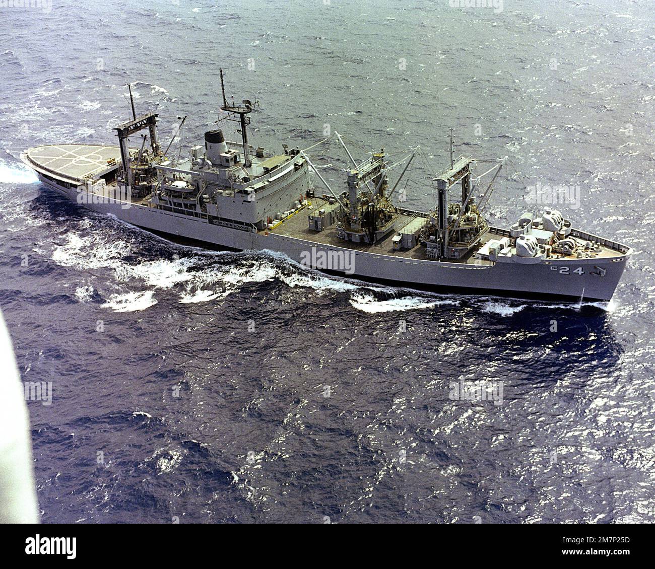 A starboard view of the ammunition ship USS PYRO (AE 24) underway ...