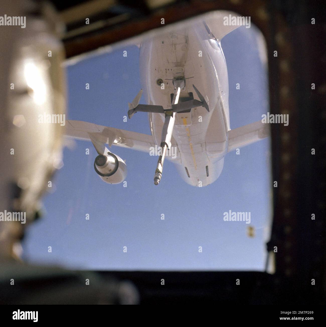 A close-up view of a KC-10A Extender aircraft with a lowered refueling ...