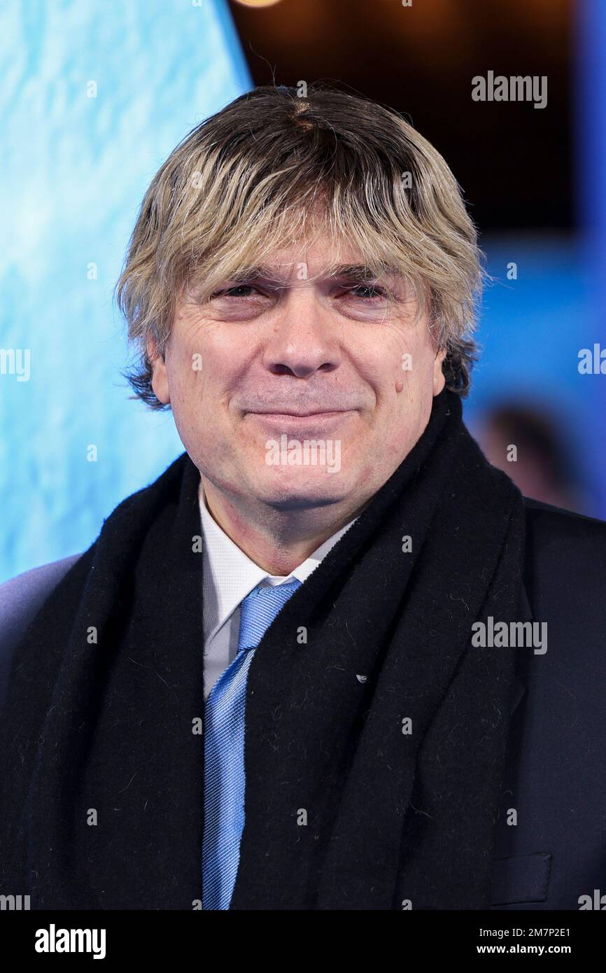 Composer Simon Franglen poses for photographers upon arrival at the ...