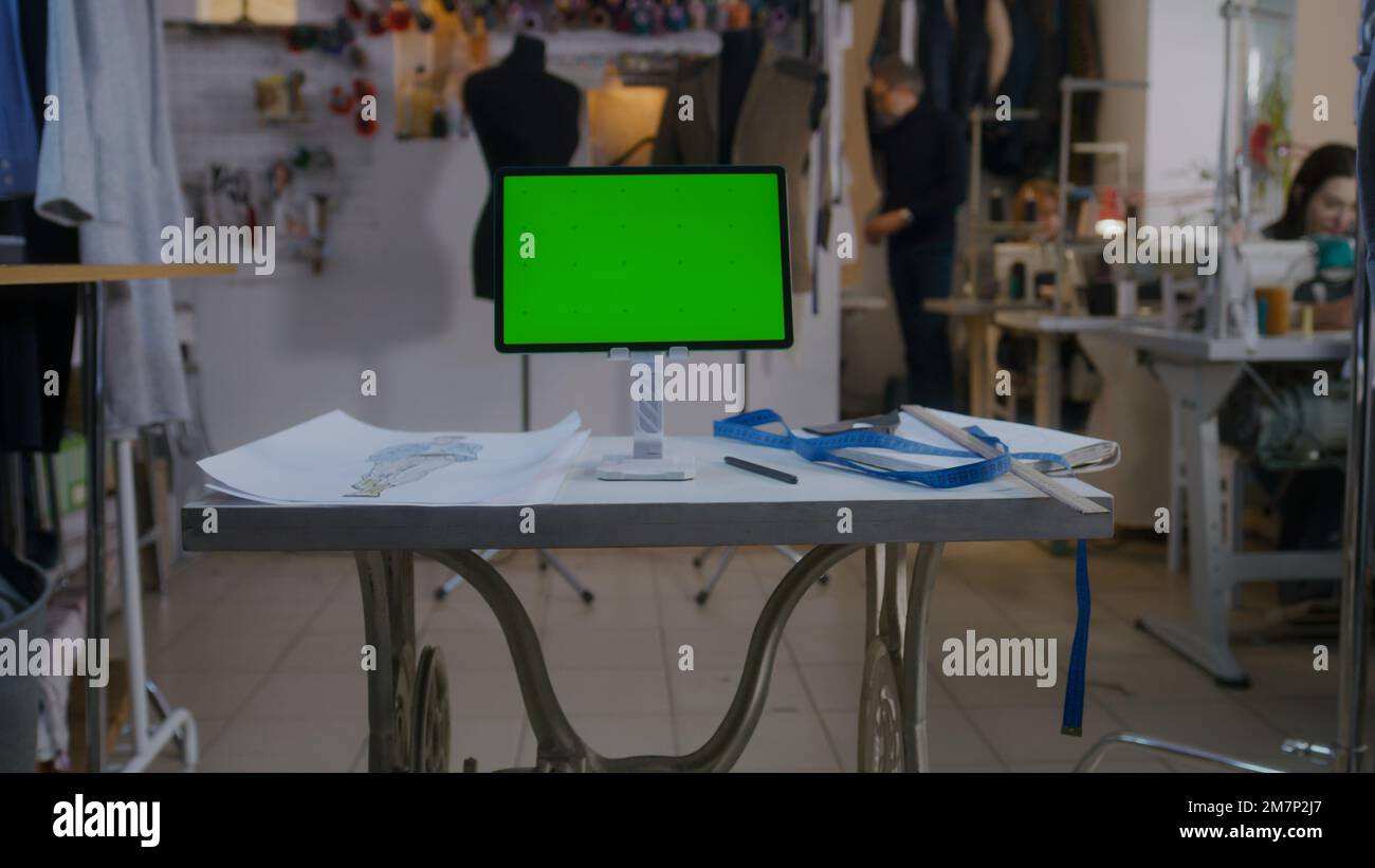 Digital tablet computer with green screen chromakey standing on the ...