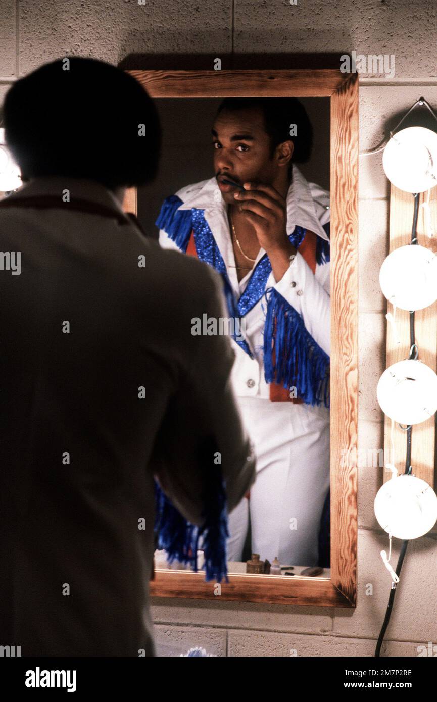 SGT Cornelius A. Settles, 13th Missile Warning Squadron, checks his ...