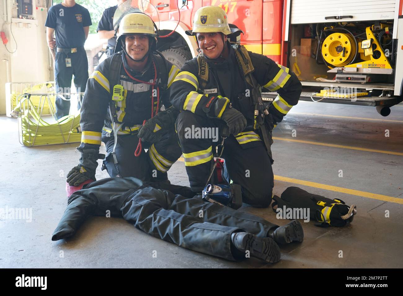 An "unconscious" victim is rescued by Moritz Schraut (left) and Tobias ...