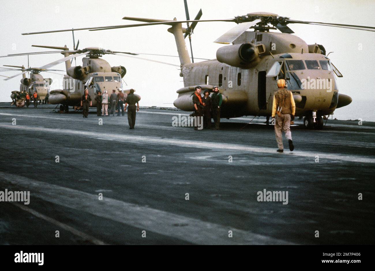 A right side view of three RH-53 Sea Stallion helicopters on the flight ...