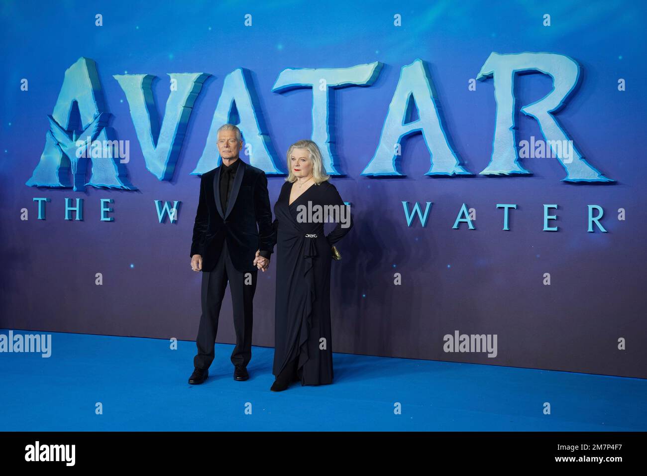 Stephen Lang, left, and Kristina Watson pose for photographers upon ...