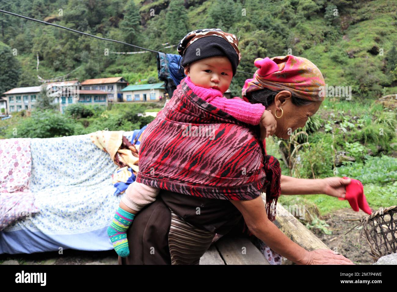 Lukla, Nepal, September 30th 2018 - A traditional Sherpa grandmother ...