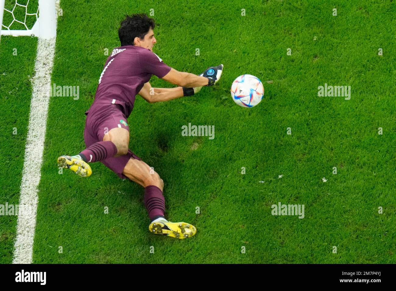 Morocco's goalkeeper Yassine Bounou saves a penalty kick during the ...