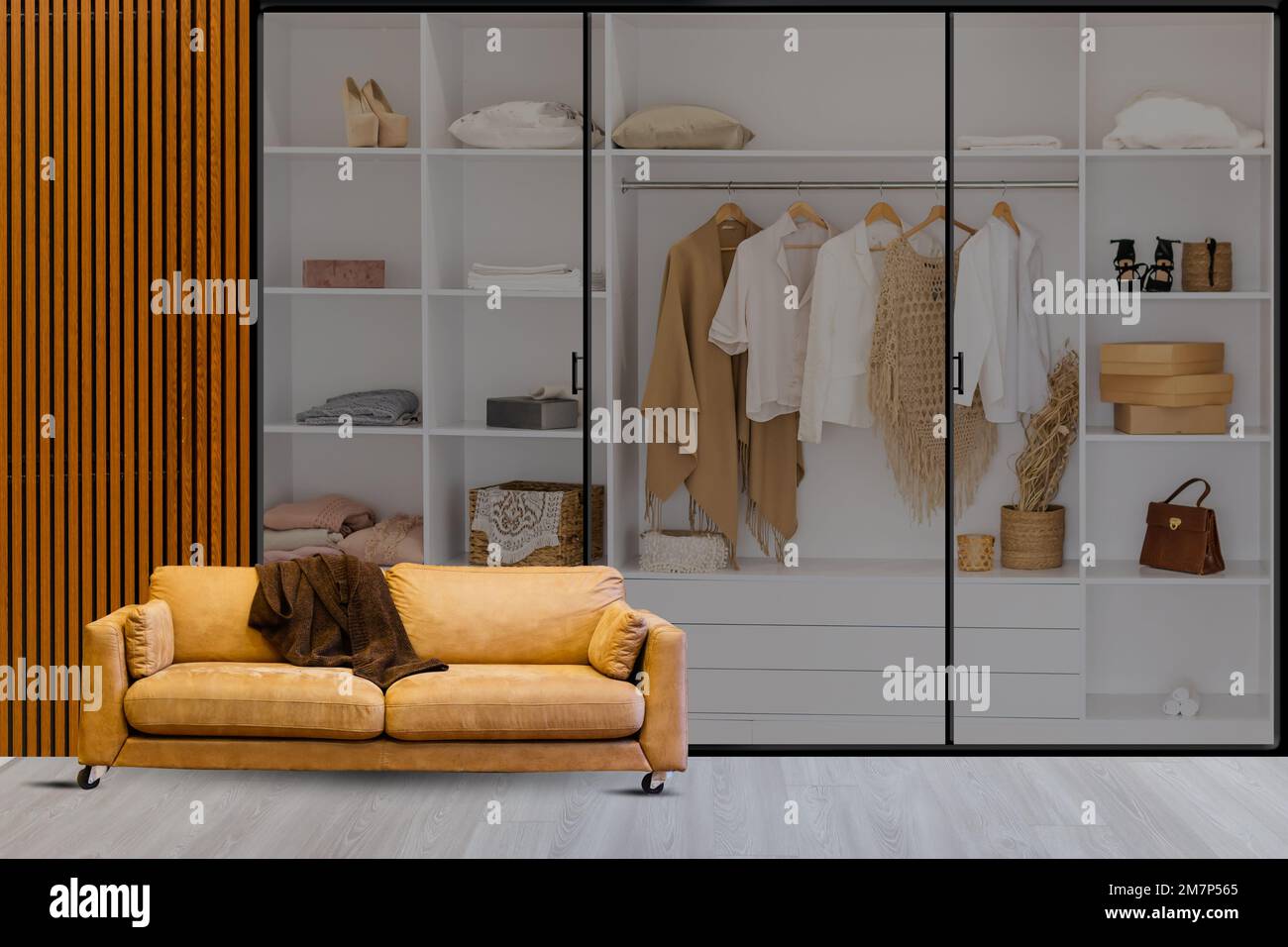 Big wardrobe with different clothes for dressing room. Interior ...