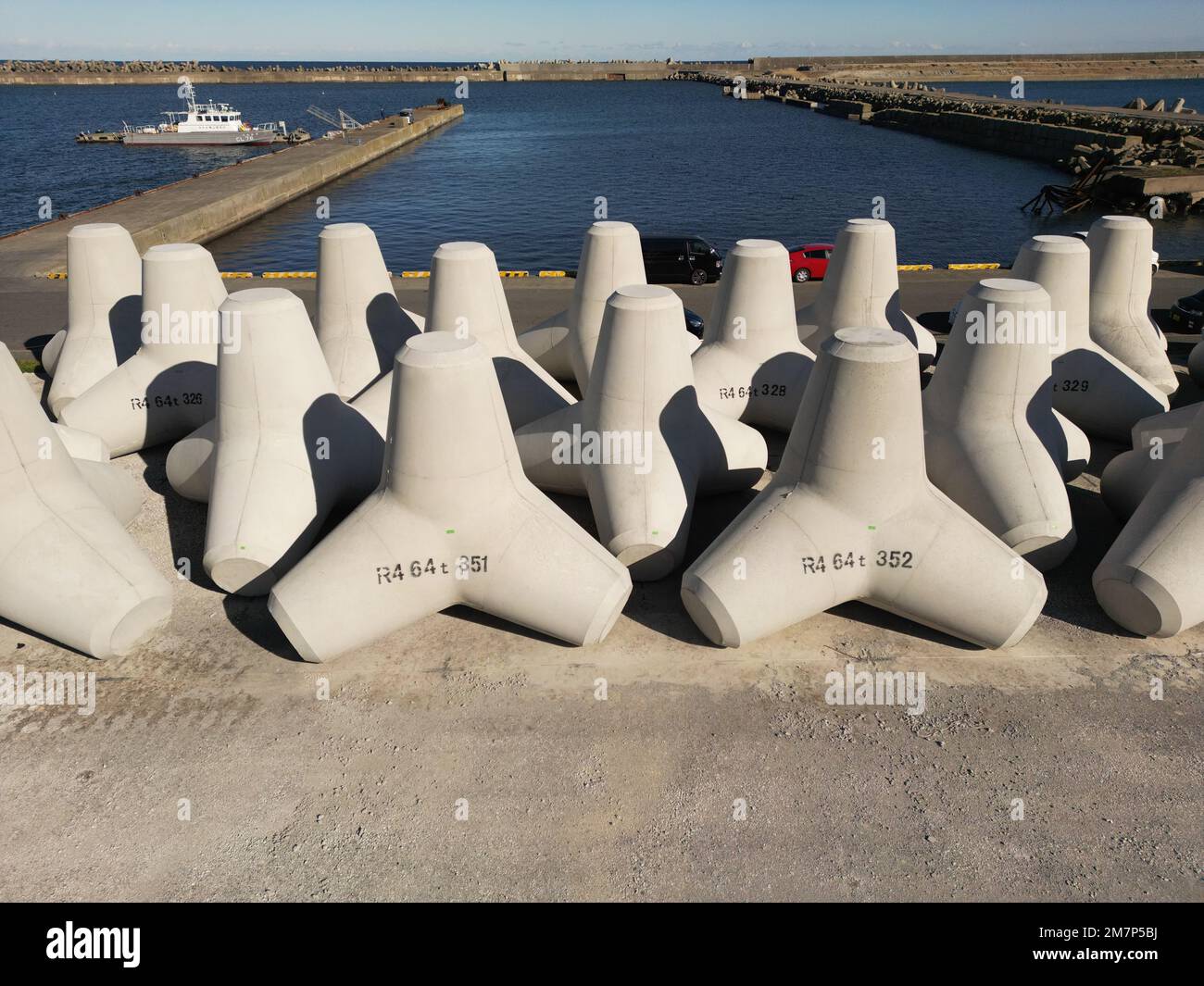 The group of tetrapods at the seashore in Japan on a sunny day Stock ...