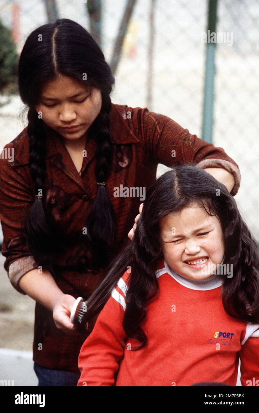 Children brush each other's hair at St. Vincent's Home for Amerasian ...