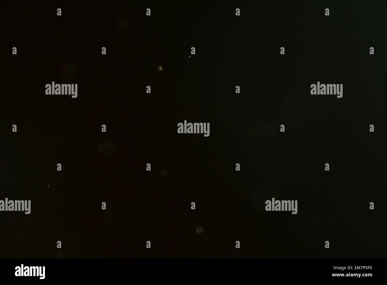 Dust particles overlay texture on black background Stock Photo - Alamy